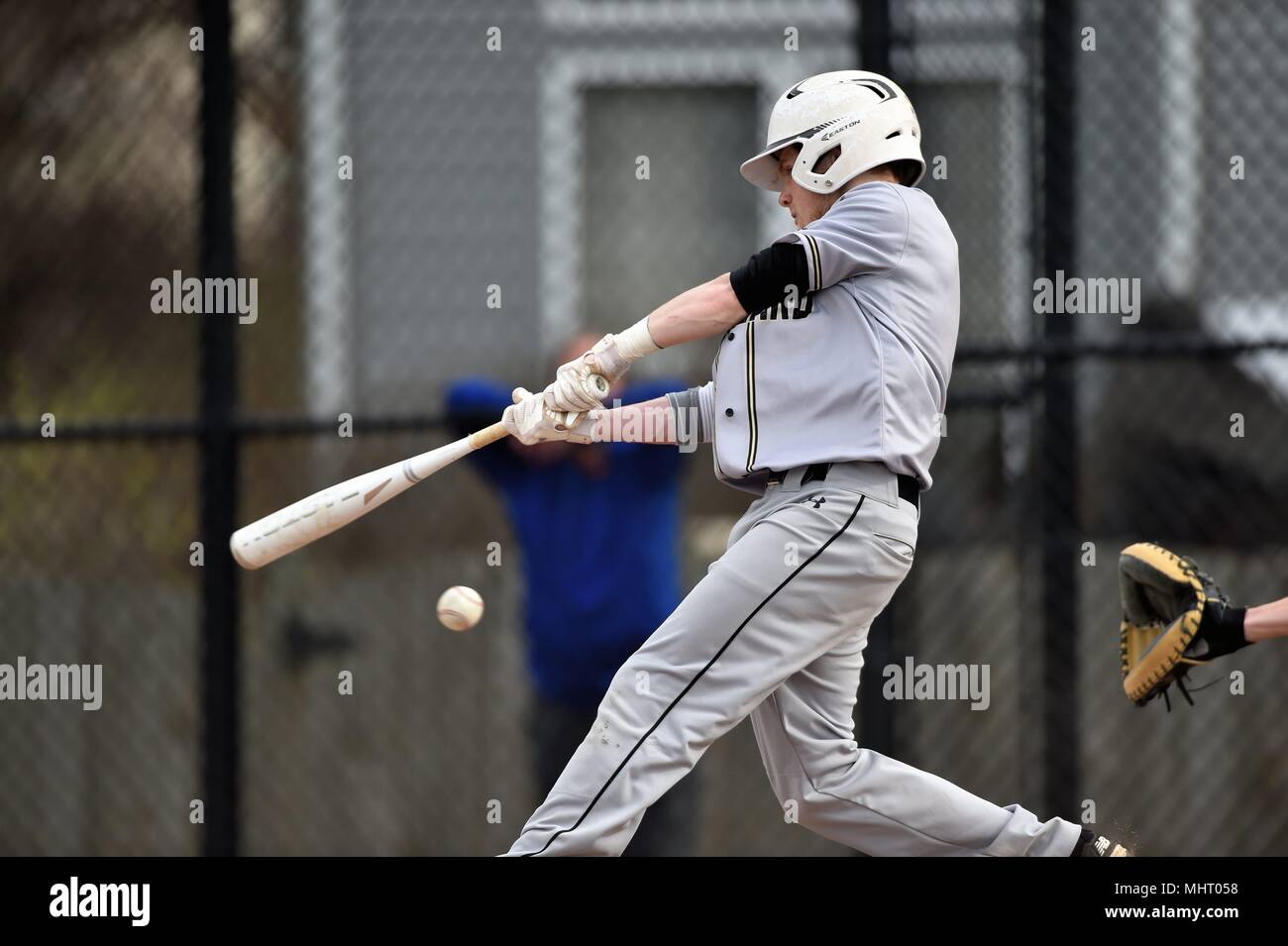 Hitter swinging and missing a pitch for a strike. USA Stock Photo - Alamy
