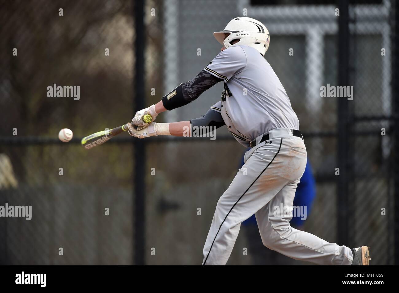 High School Baseball Player Batting