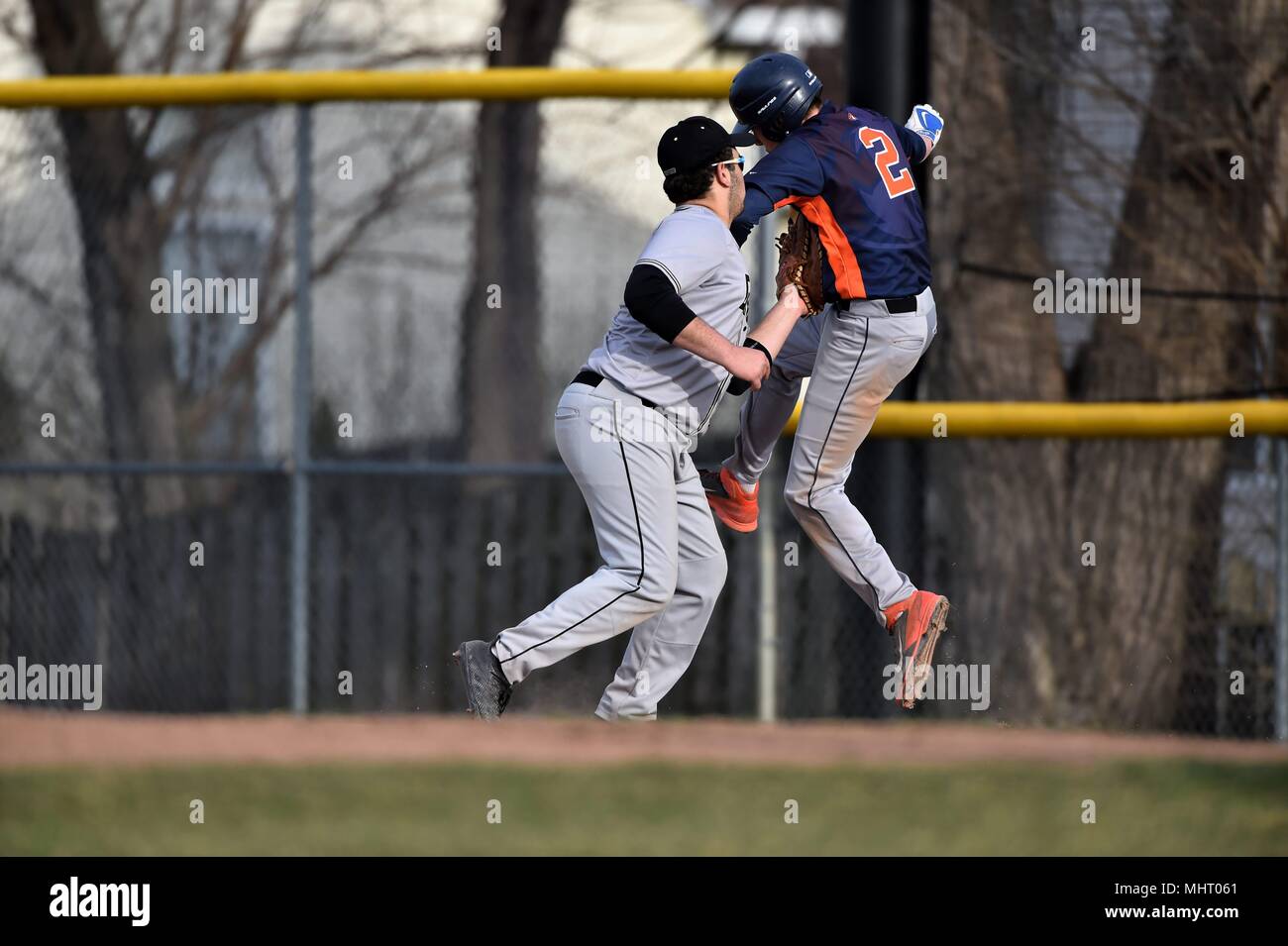 First baseman coming off the bag to accept a throw from across the ...