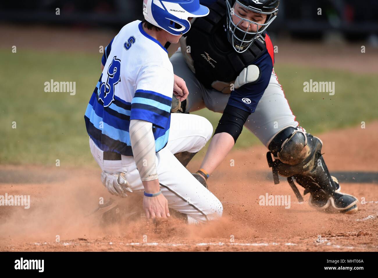 Runner scoring on a play at the plate ahead of the tag by the opposing ...