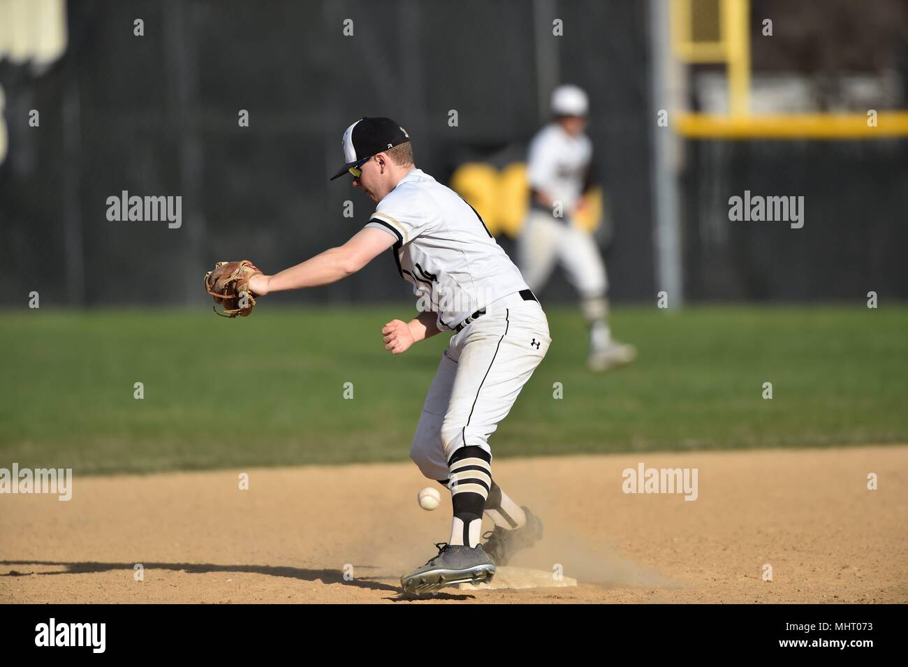 Youth shortstop throw ball hi-res stock photography and images - Alamy
