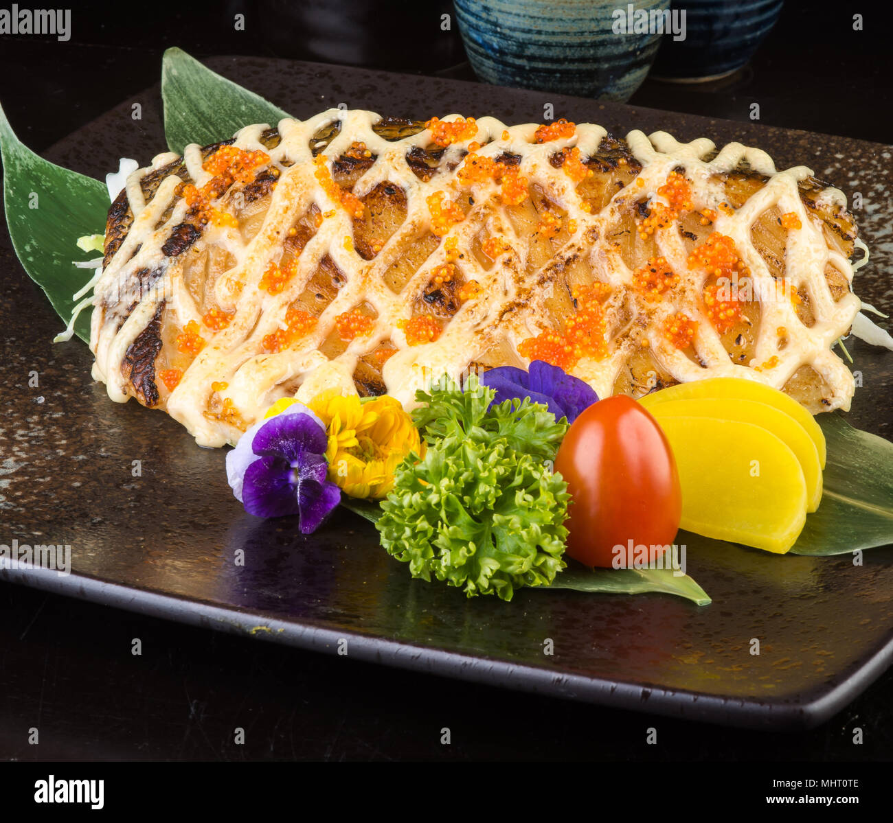Fried saba fish sauce hi-res stock photography and images - Alamy
