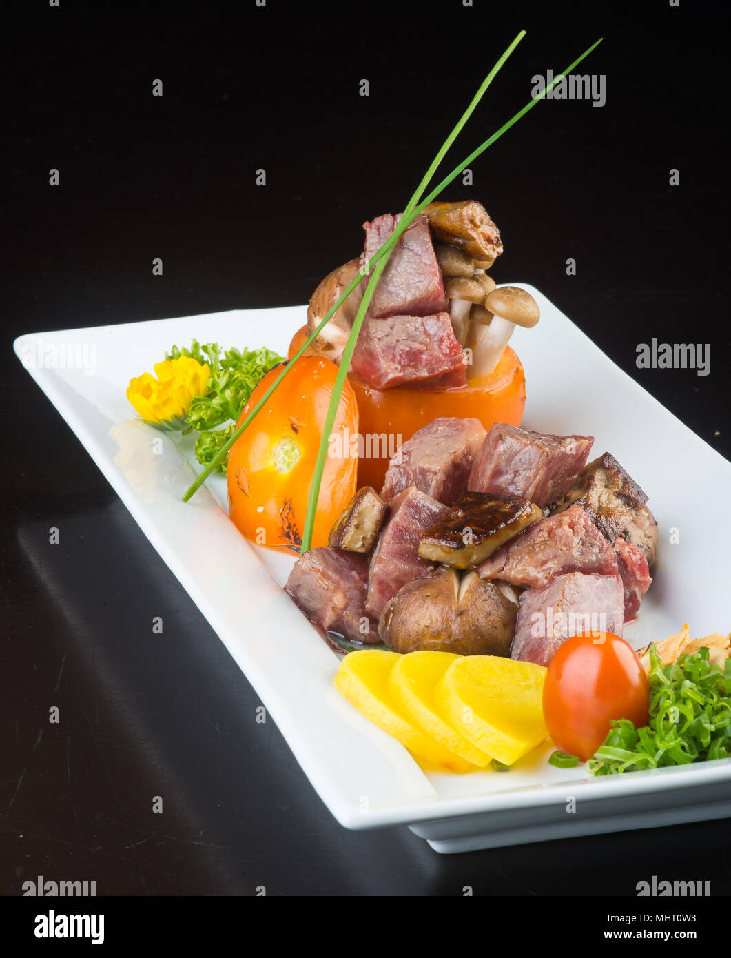 japanese cuisine. beef cube on background Stock Photo - Alamy