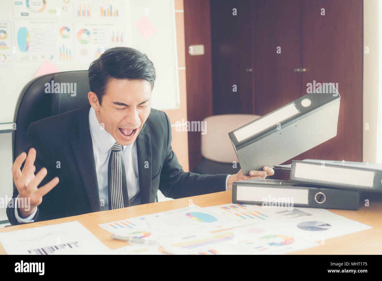stressed business man in the office Stock Photo - Alamy