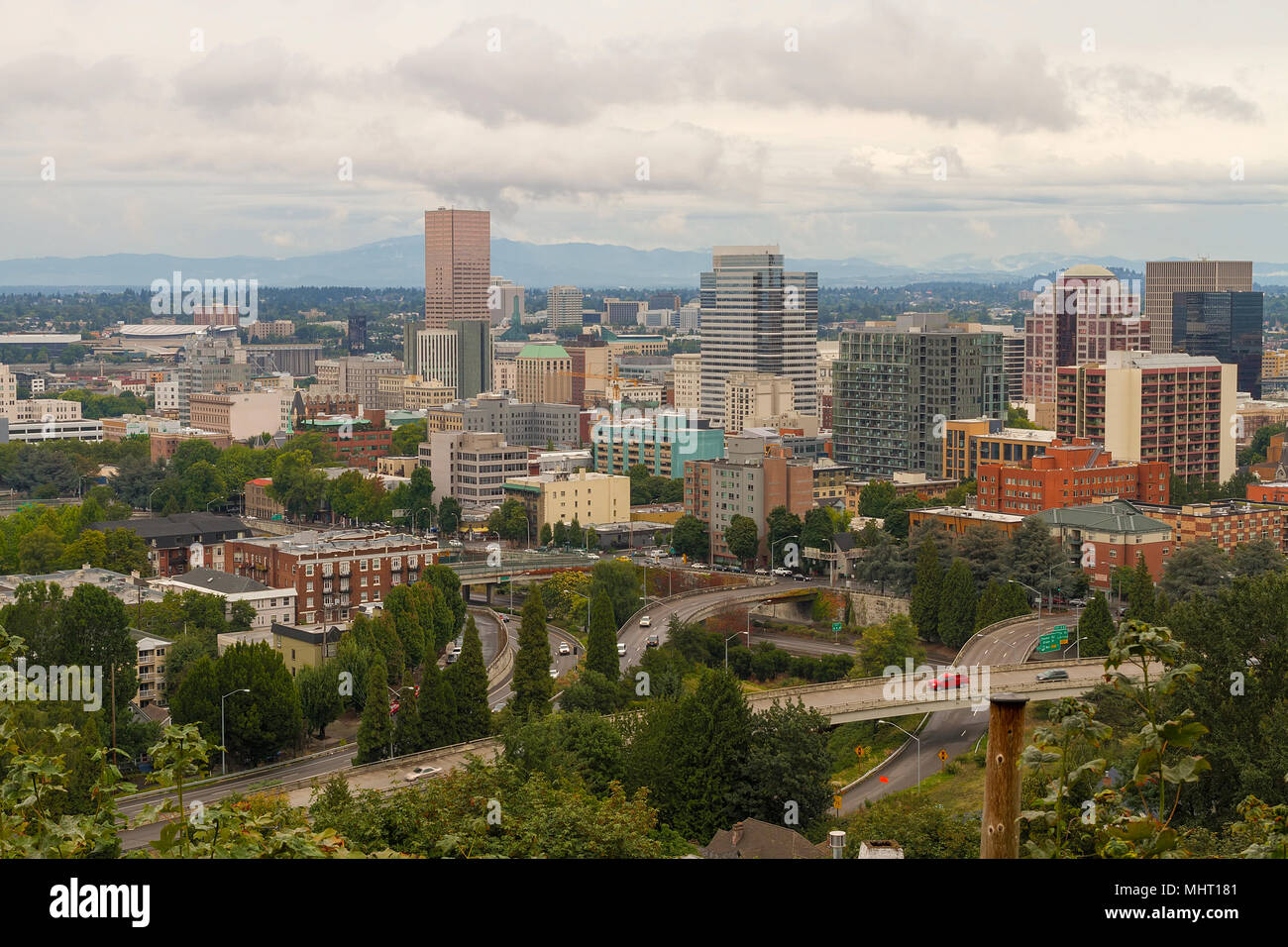 Portland Oregon downtown cityscape scenic view by freeway nestled among ...