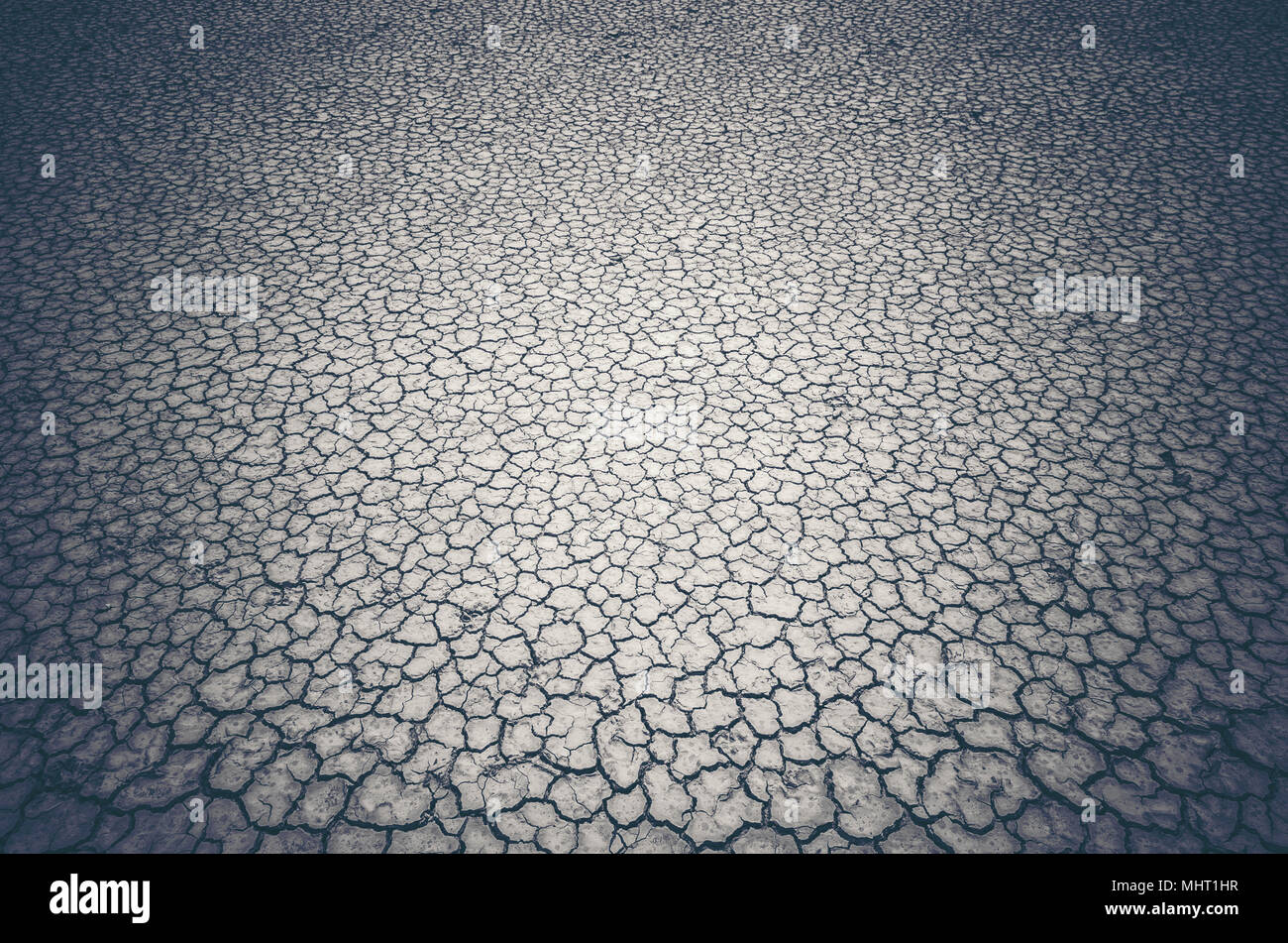 Dry cracked earth background, clay desert texture Stock Photo - Alamy