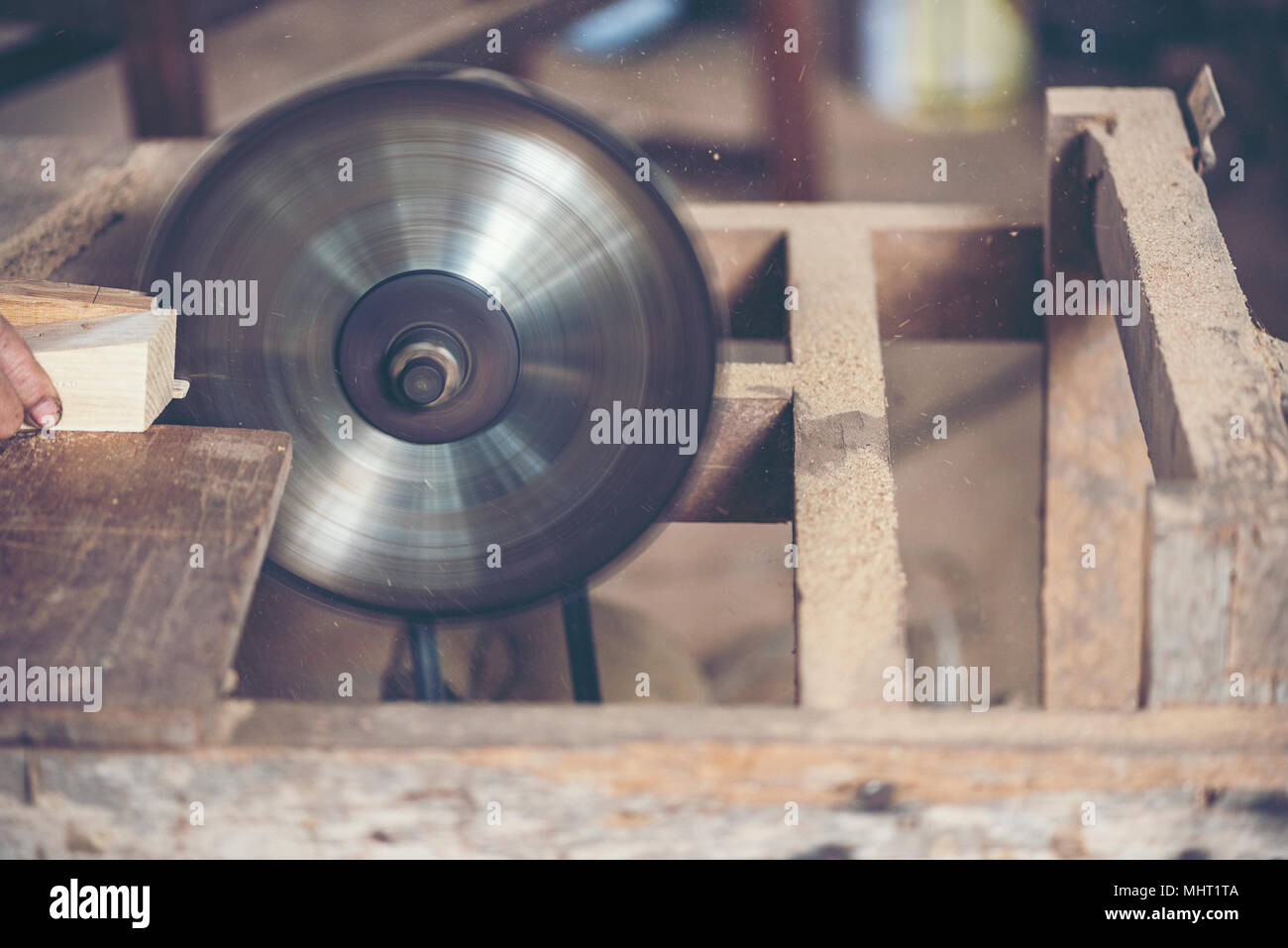 Background image of woodworking workshop: carpenters work table with ...