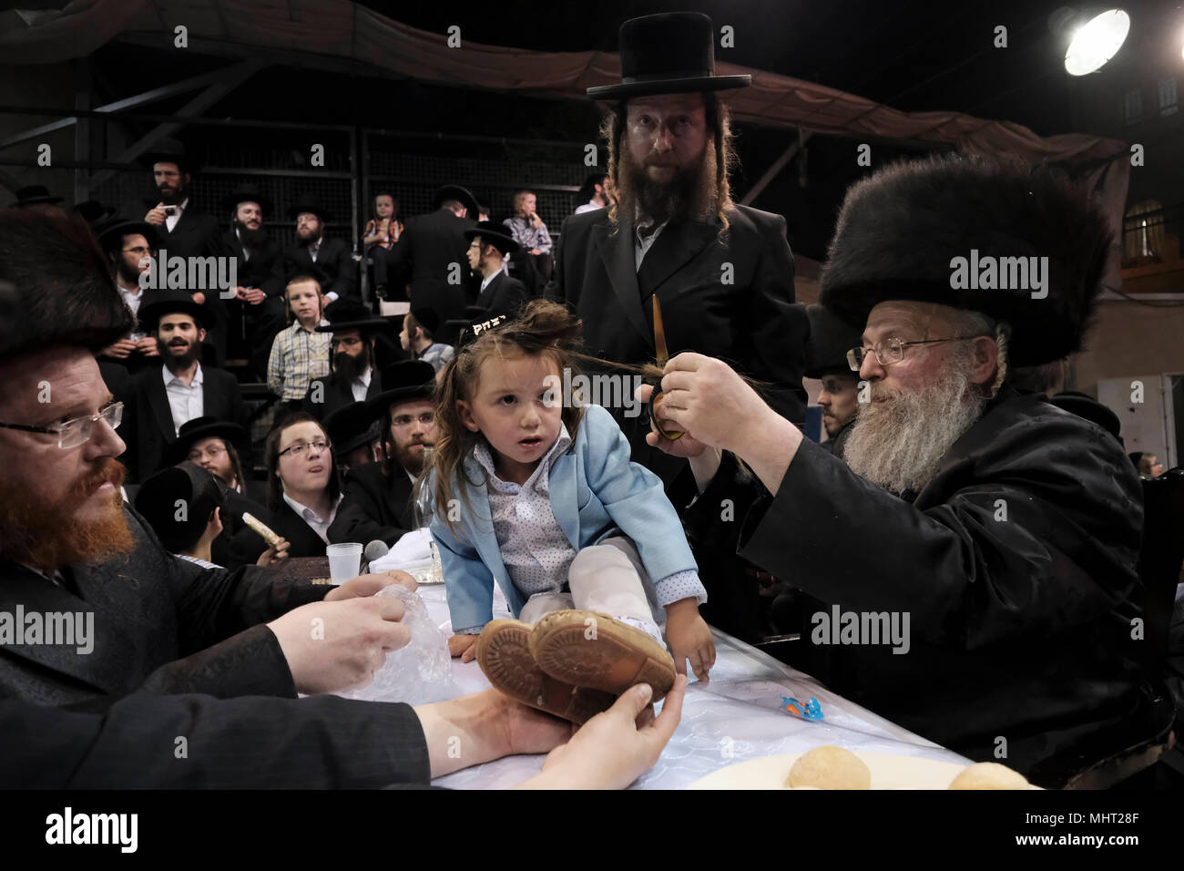 A three-year old Jewish boy takes part in the traditional Halake ...
