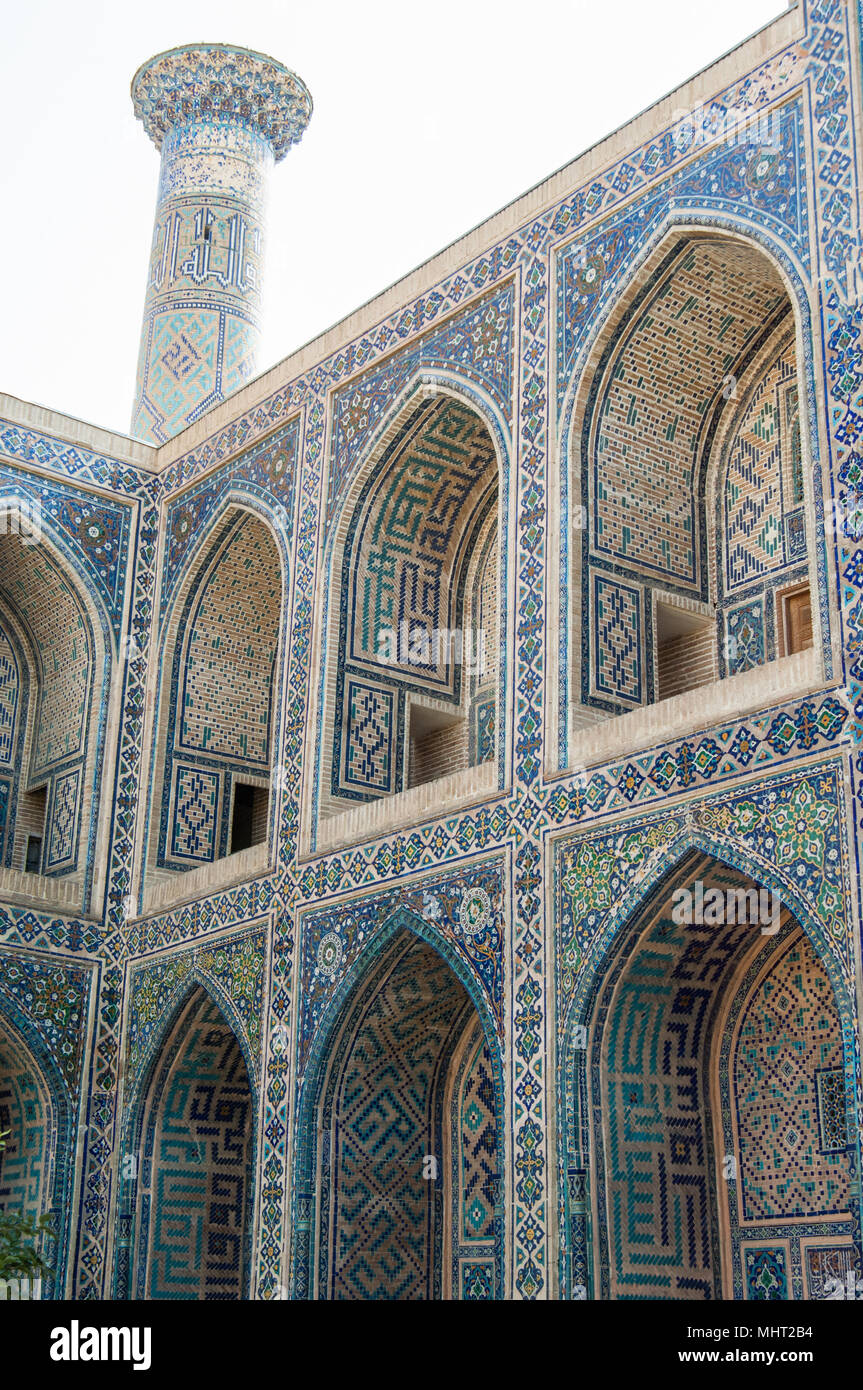 The arch and the exterior design of the ancient Registan in Samarkand ...