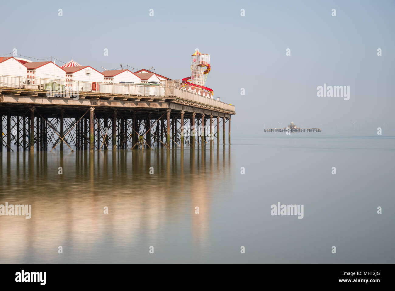 Minimalist fine art image of colorful pier in juxtaposition with old ...