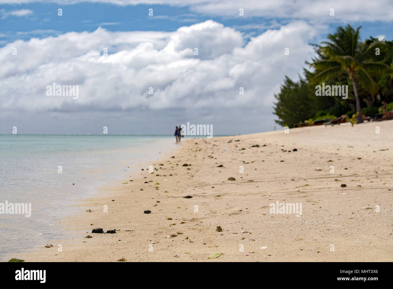 man and woman walking on polynesia beach tropical paradise with crystal ...