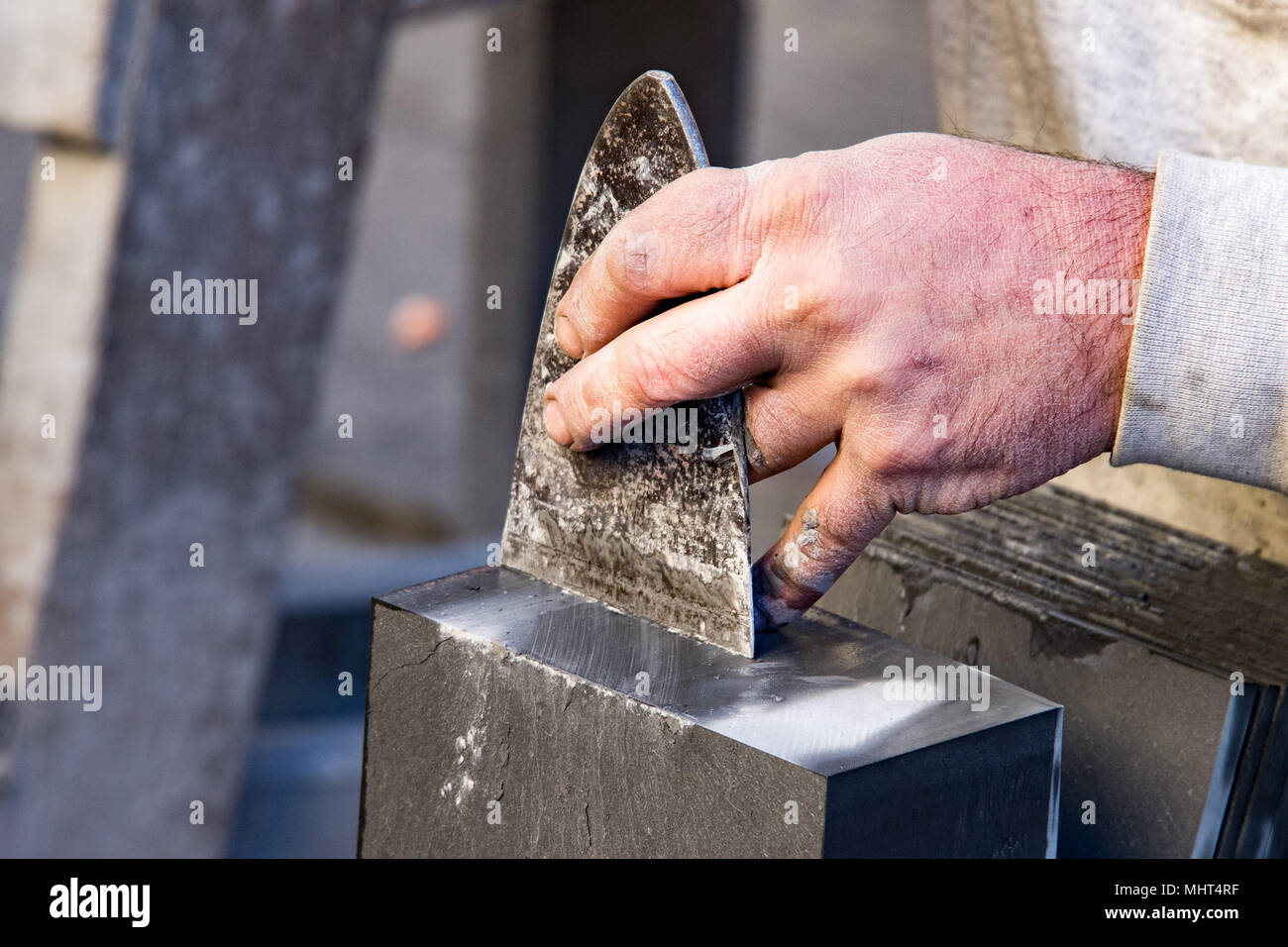 Hands man cutting artisanal hi-res stock photography and images - Alamy