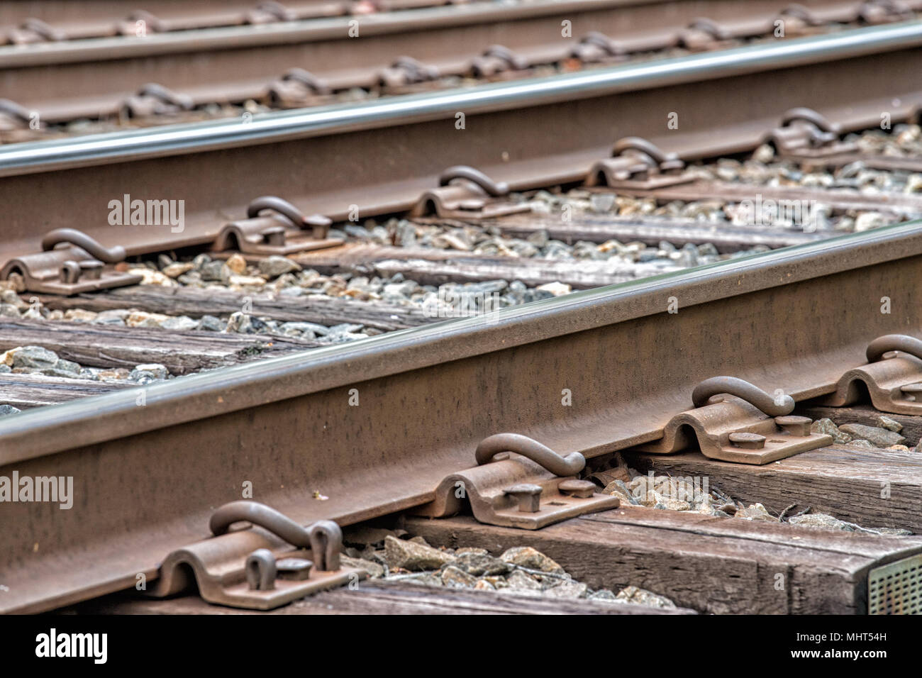 Railroad train tracks detail close up Stock Photo - Alamy