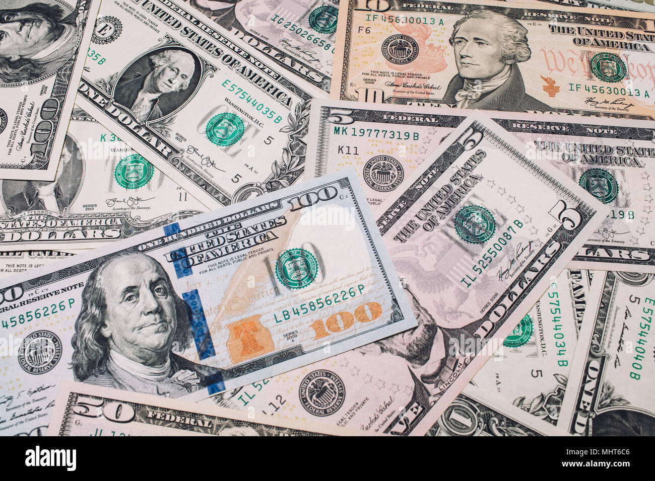 Mixed dollar, money background Stock Photo - Alamy