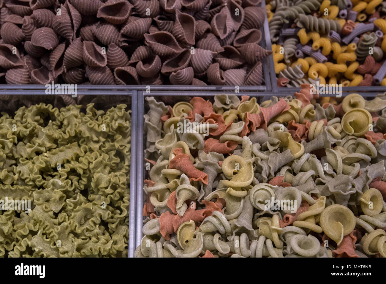diffrent kind of colorful italian made pasta on display for sale Stock ...
