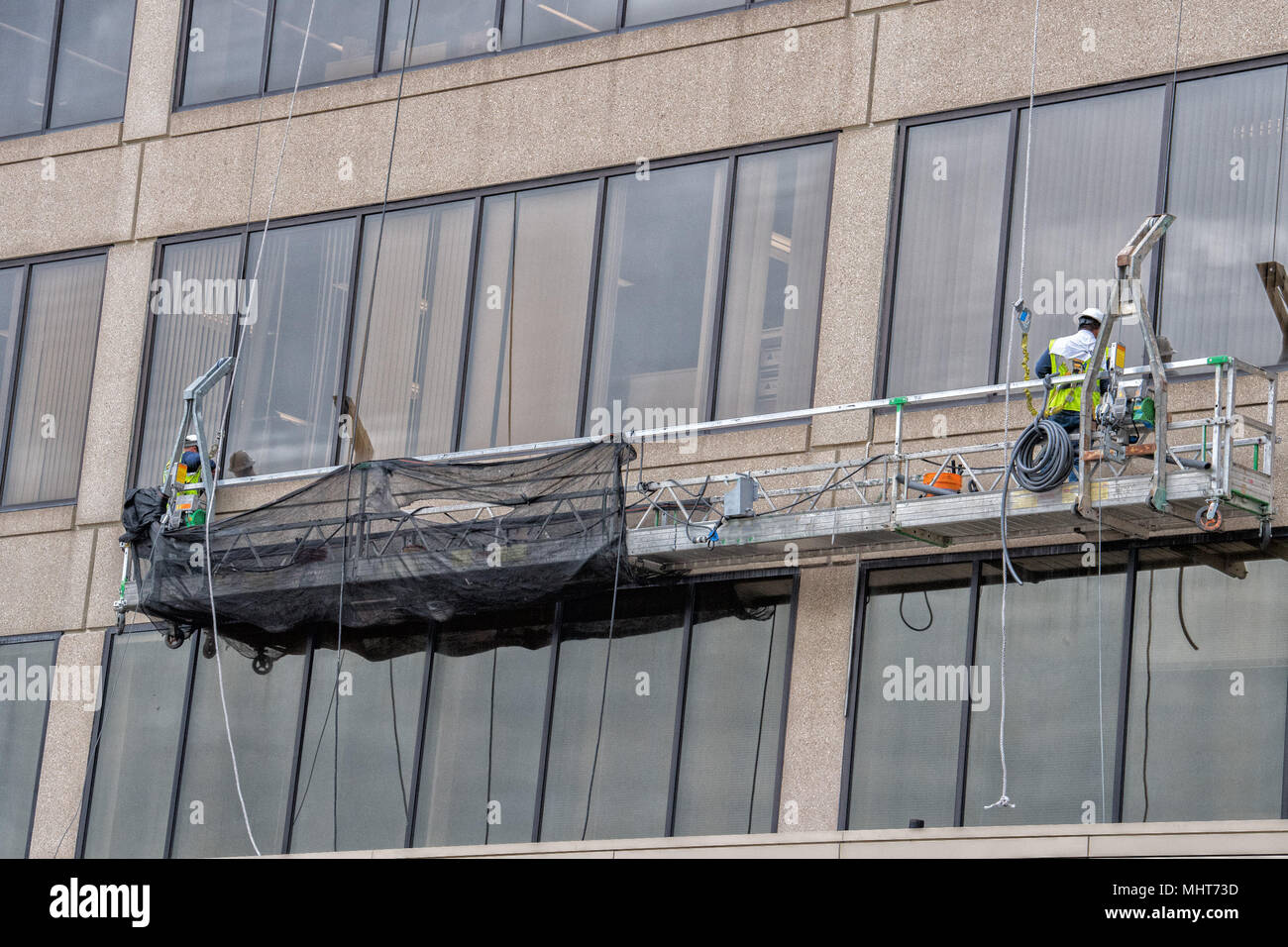 skyscraper windows cleaning in manhattan new york Stock Photo - Alamy