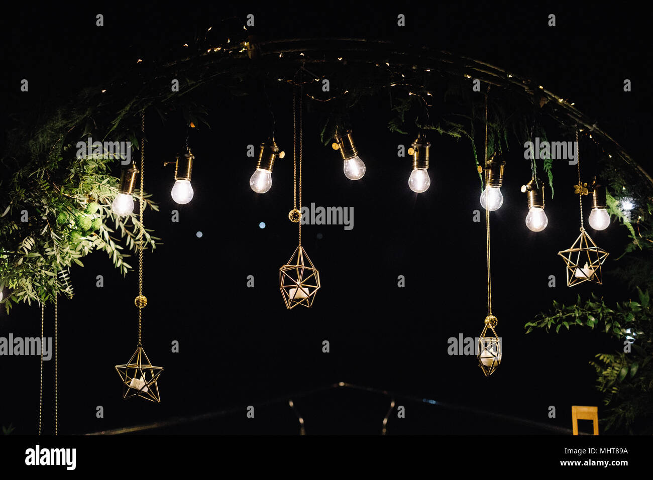Light bulb decor in outdoor party Stock Photo - Alamy