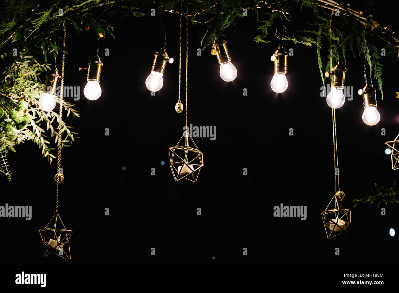 Light bulbs over dark texture Stock Photo - Alamy