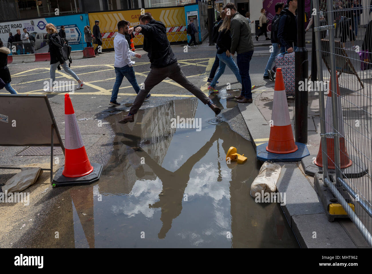 Leaping puddle city hi-res stock photography and images - Alamy