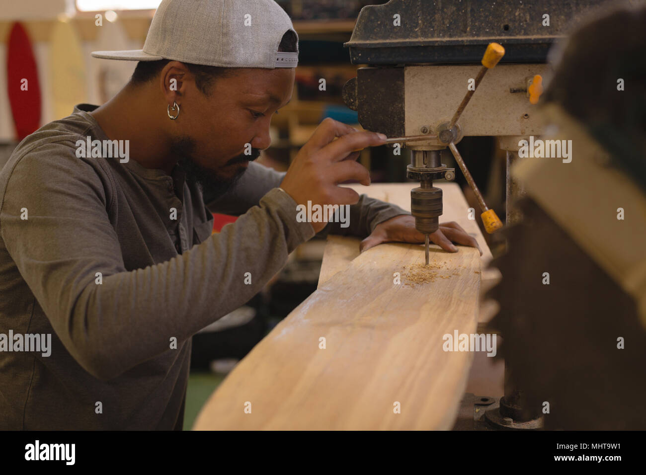 Man holding drill hi-res stock photography and images - Alamy