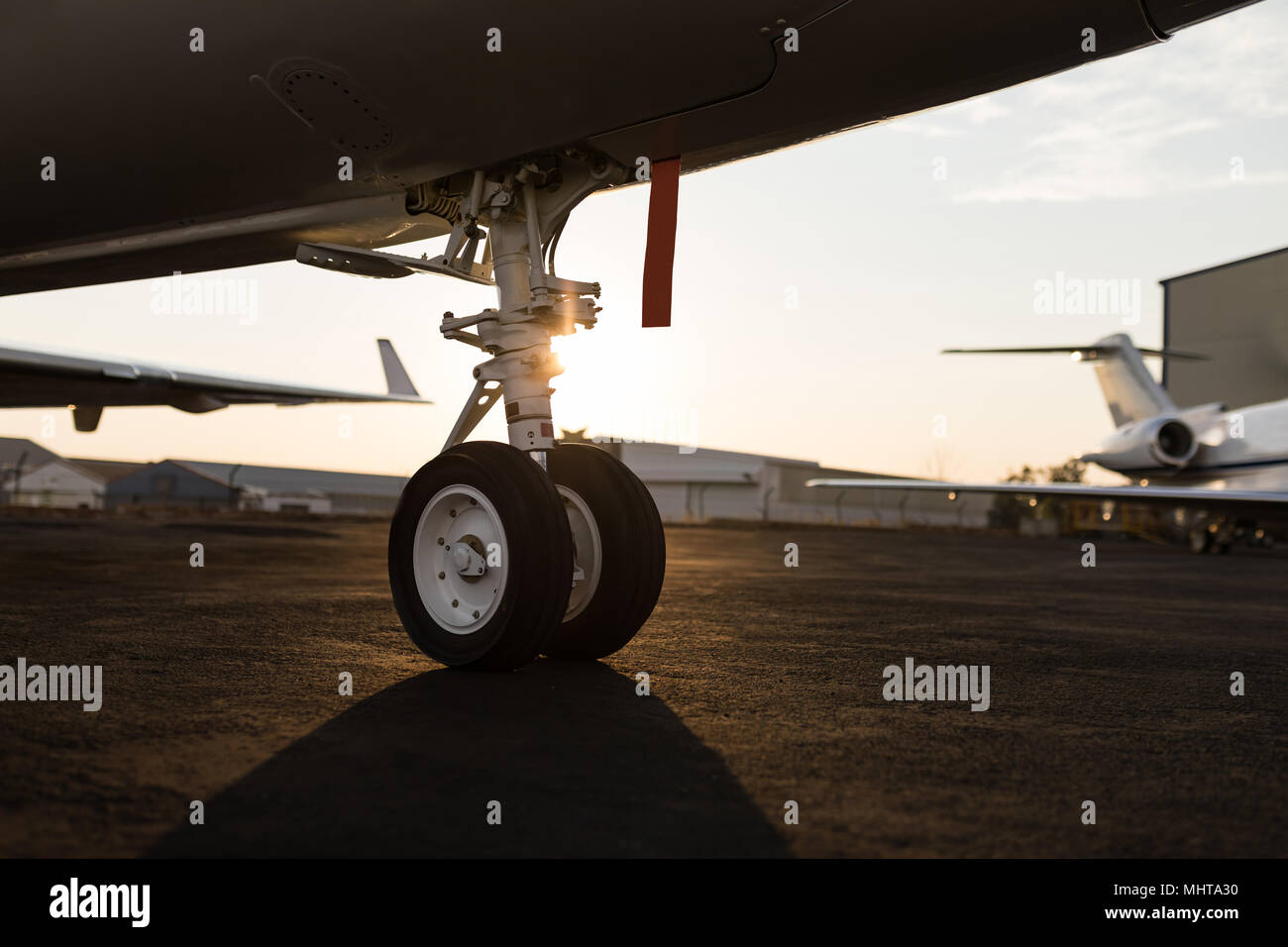 Private jet tyre at terminal Stock Photo - Alamy