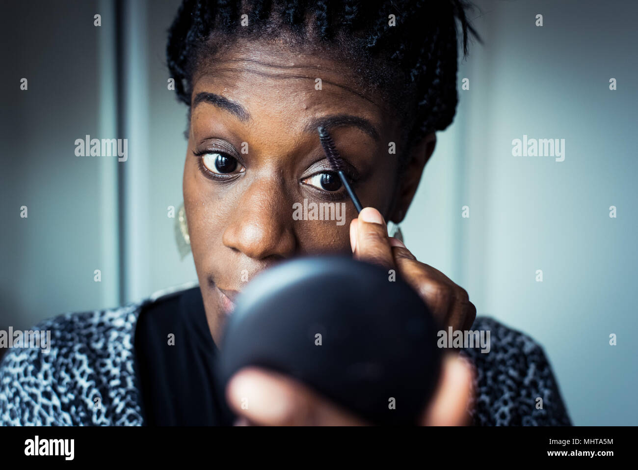 Getting ready for a night out hi-res stock photography and images - Alamy