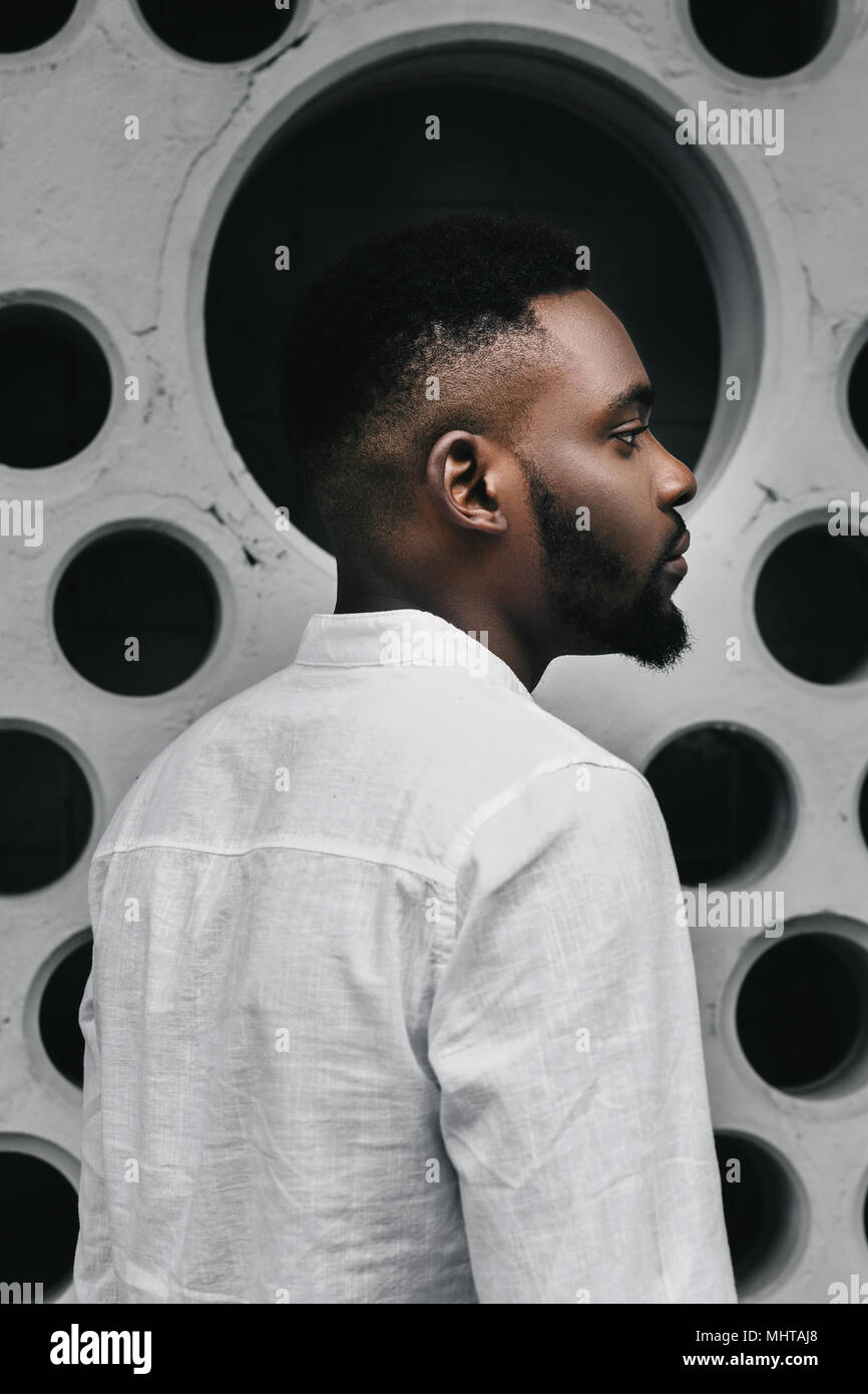 Portrait of a fashionable african american man on gray background Stock ...