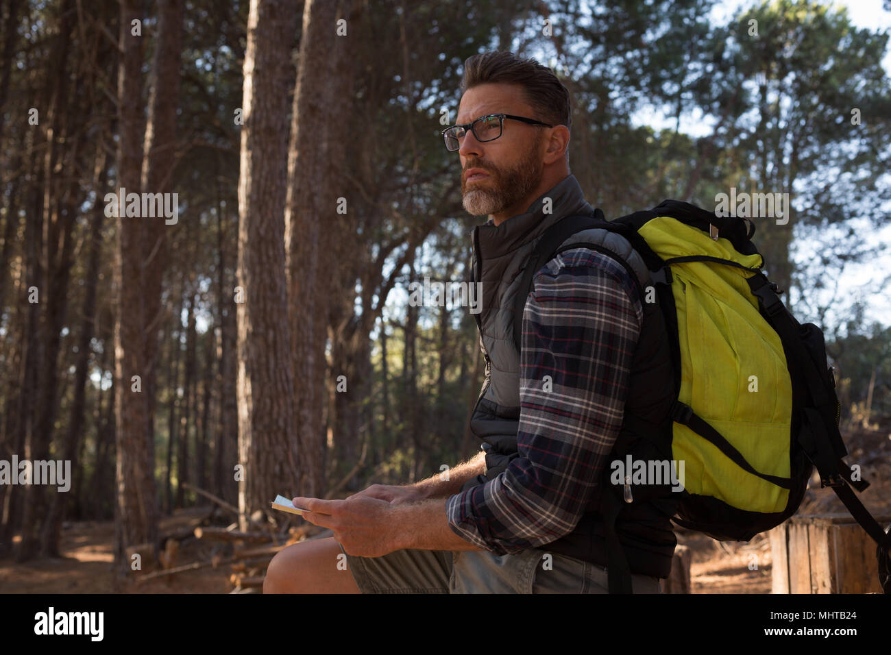 Man standing alone in forest hi-res stock photography and images - Alamy