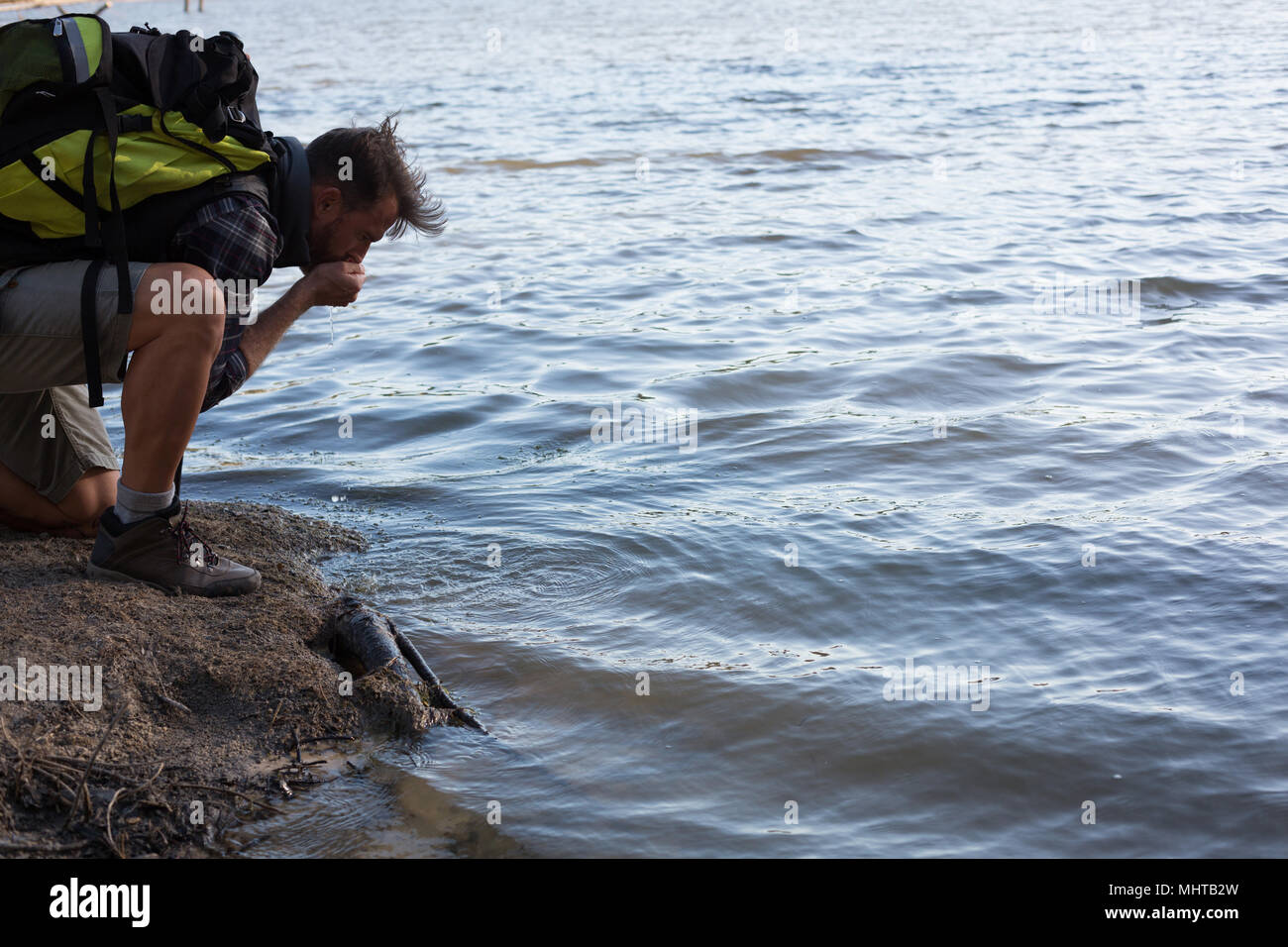 Man Drinking Water From River High Resolution Stock Photography and ...