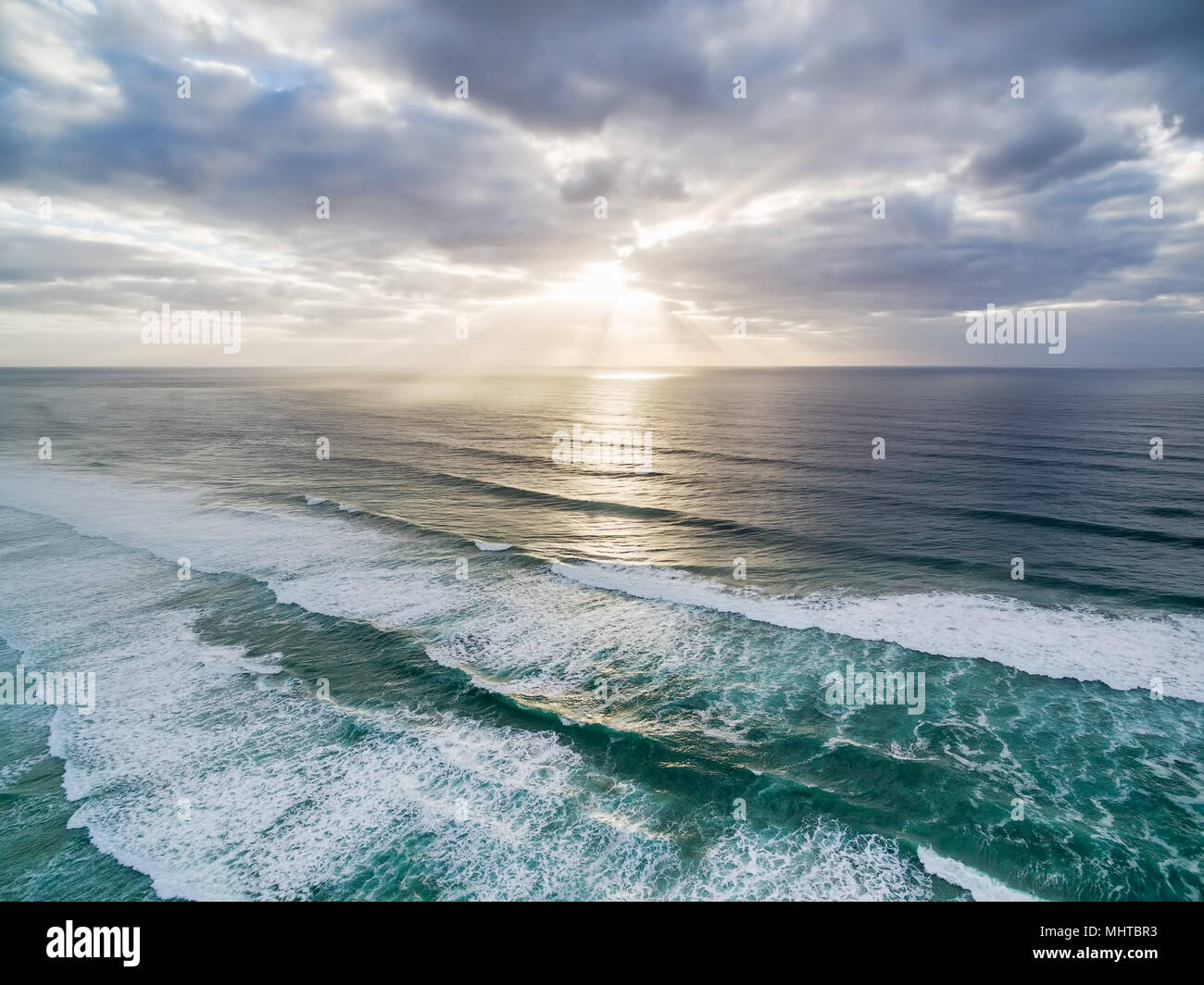 Aerial view ocean waves sunset hi-res stock photography and images - Alamy