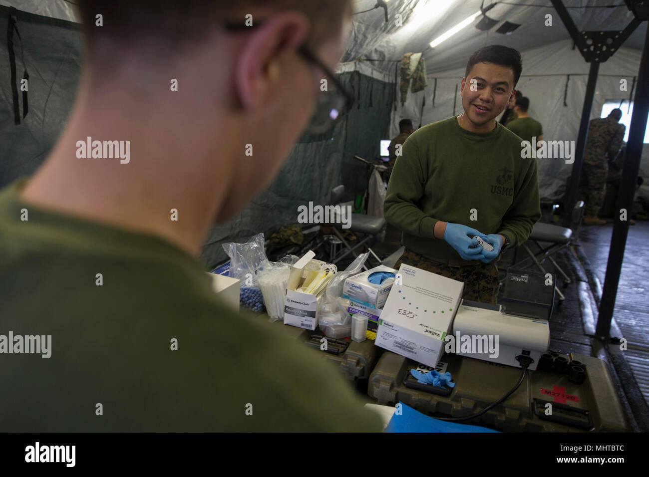 U.S. Navy Hospital Corpsman 3rd class Timothy Cleary, left, and ...