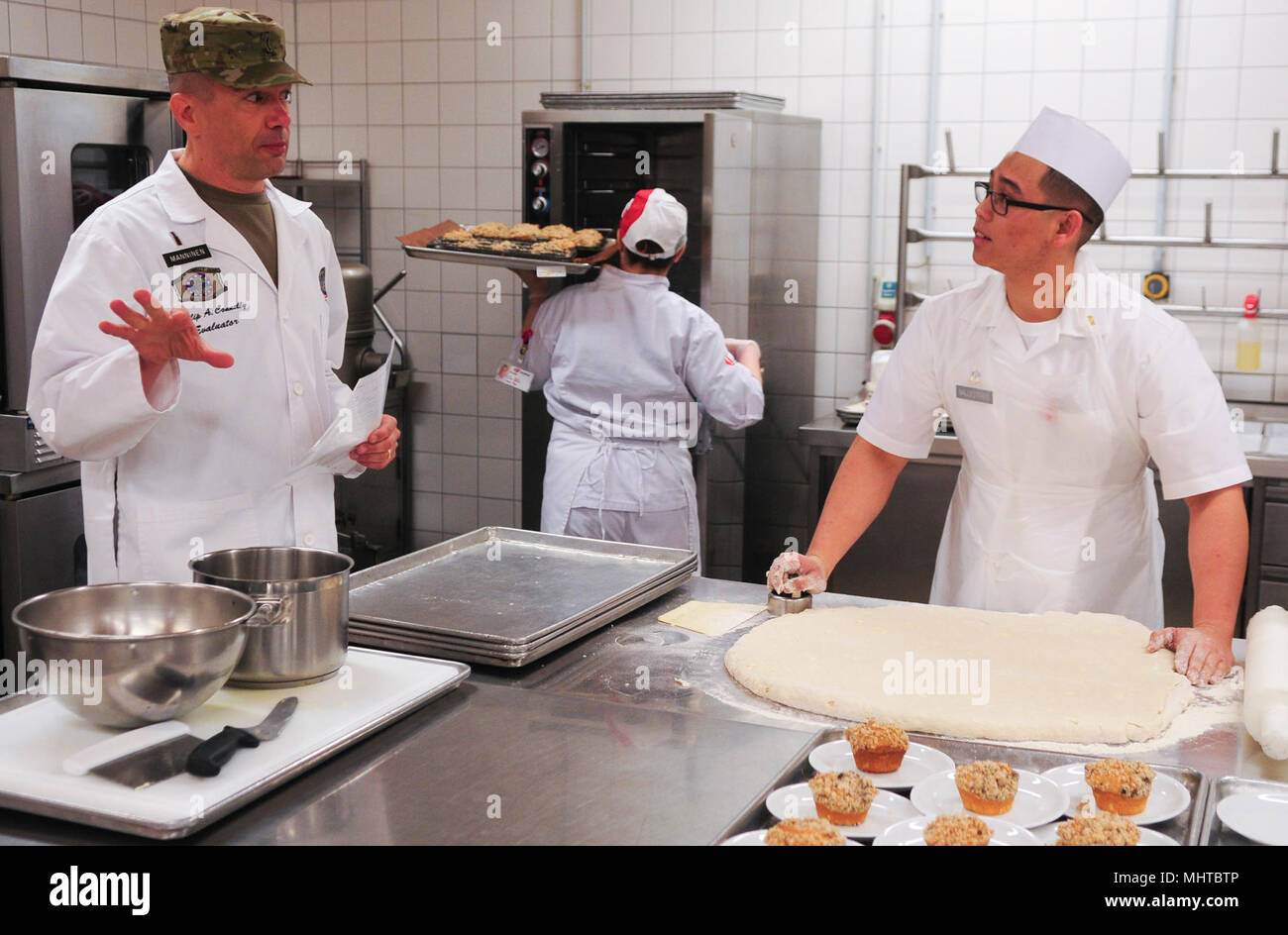Chief Warrant Officer 5 Jeffery Manninen (left), the command food ...