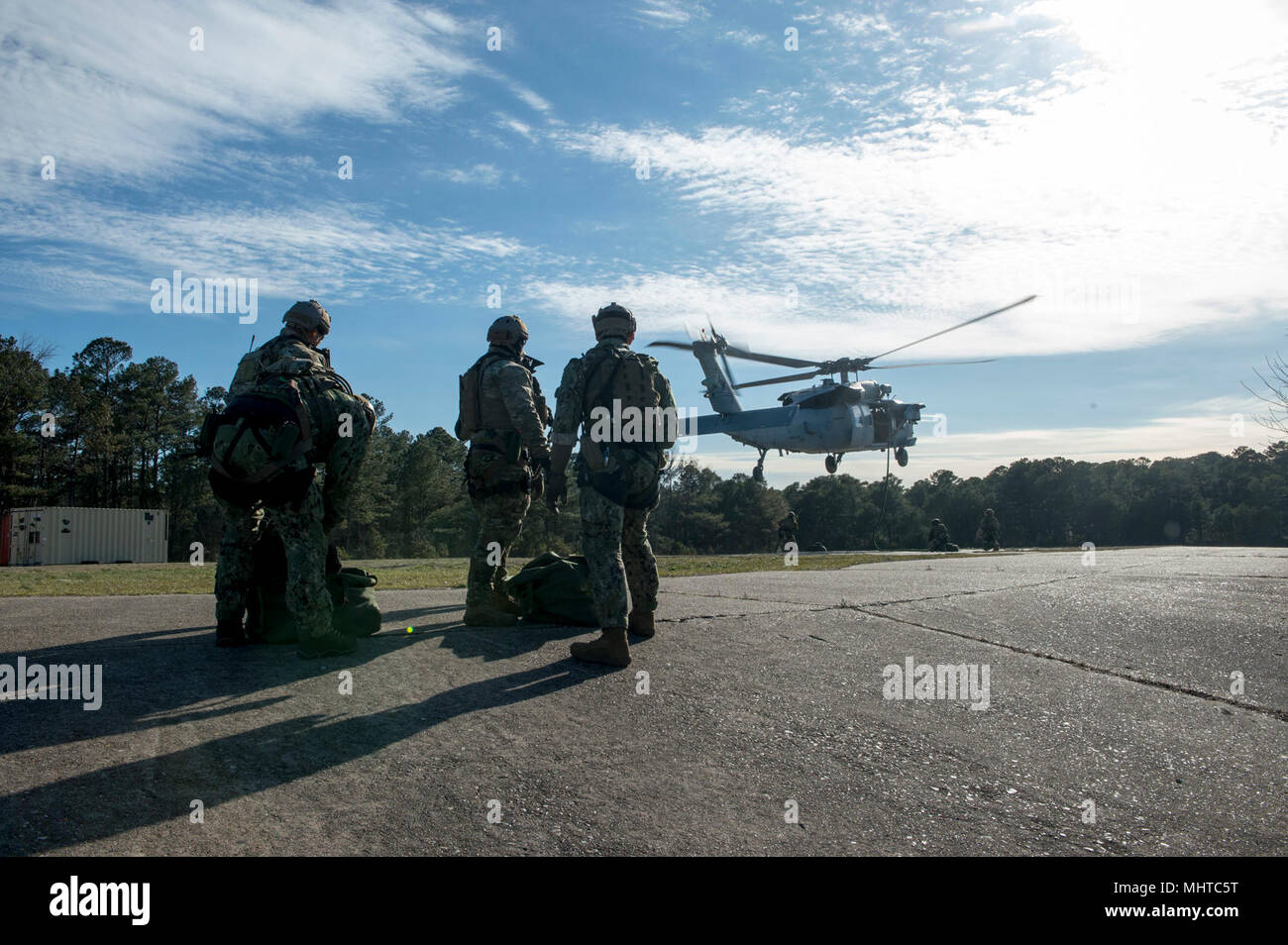 Helicopter rope suspension technique cast master hi-res stock ...