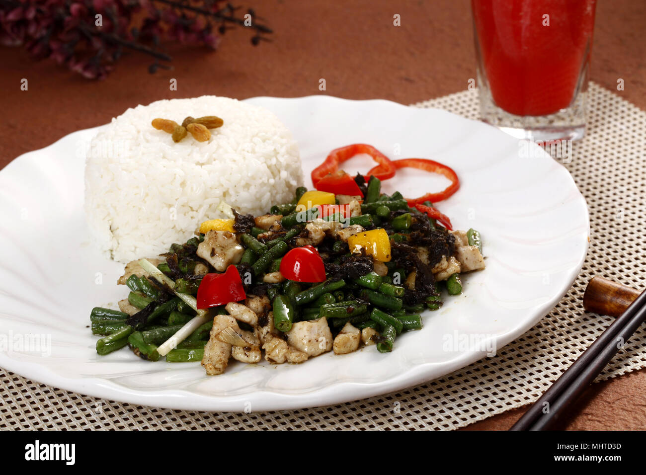 green bean chicken over rice Stock Photo - Alamy