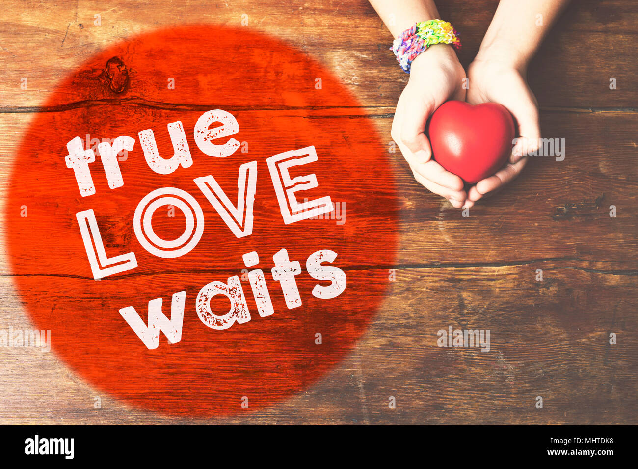 true love waits phrase printed on vintage wooden board with red heart ...