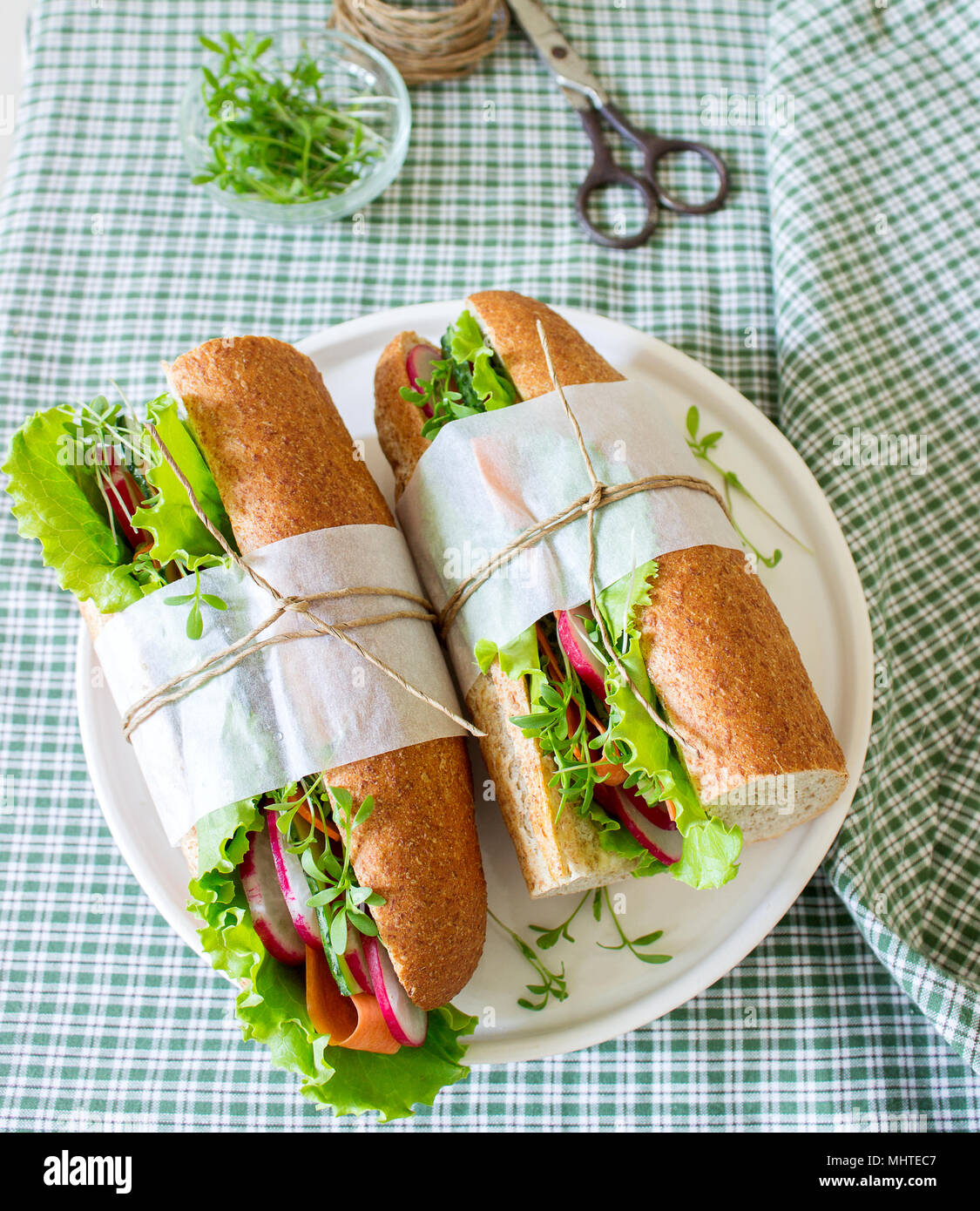 Vegetarian sandwich from bran bread with vegetables and herbs for a ...