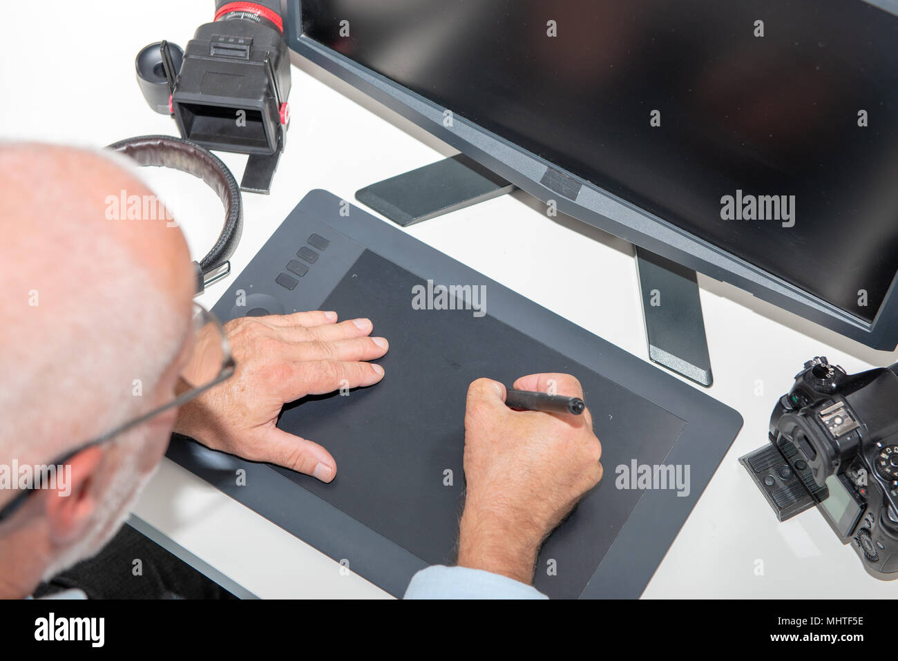 Male hands using graphics tablet hi-res stock photography and images ...