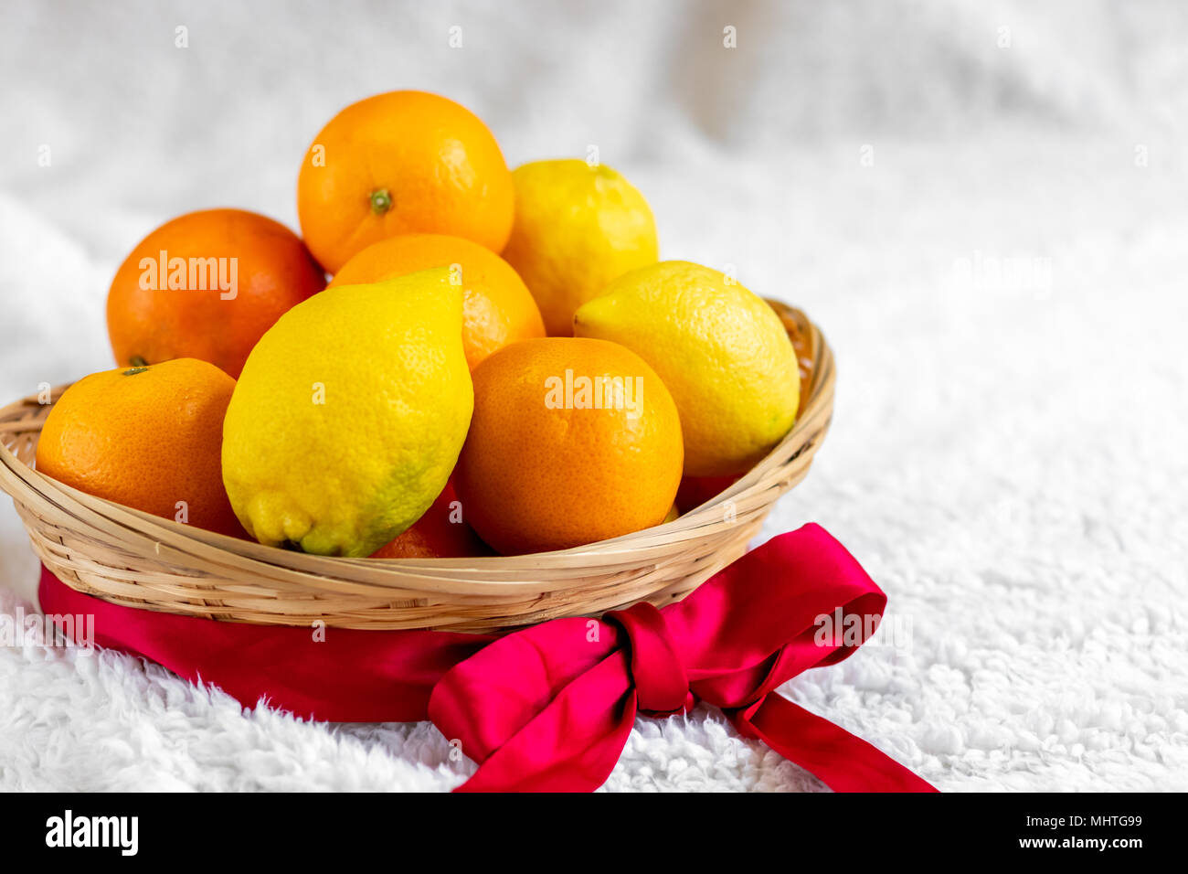 Basket full of acid fruits Stock Photo - Alamy