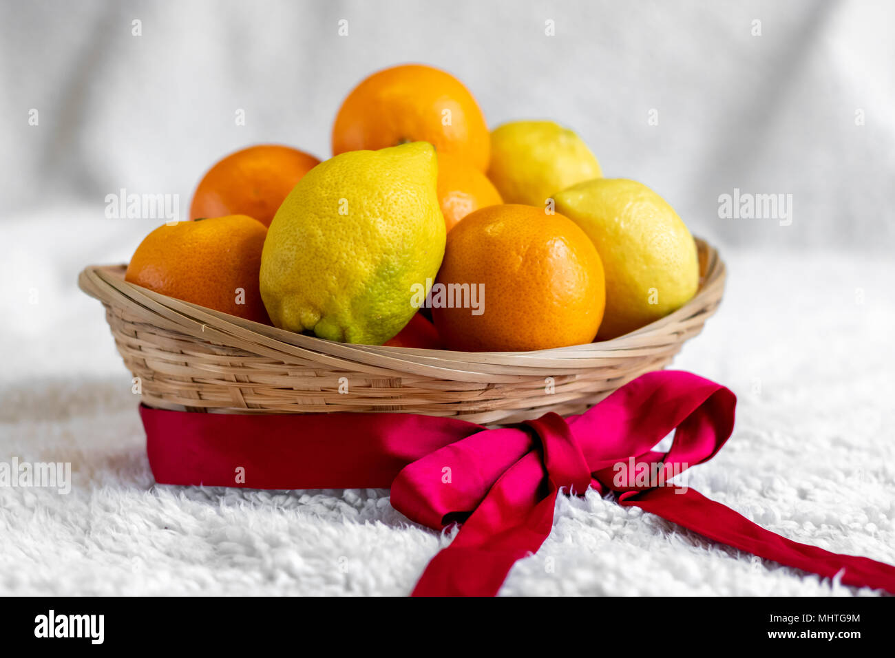Basket full of acid fruits Stock Photo - Alamy