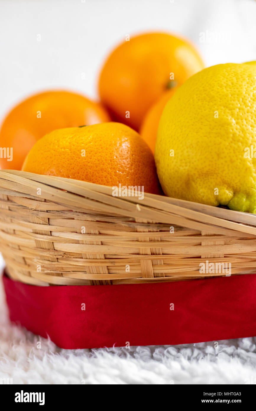 Basket full of acid fruits Stock Photo - Alamy