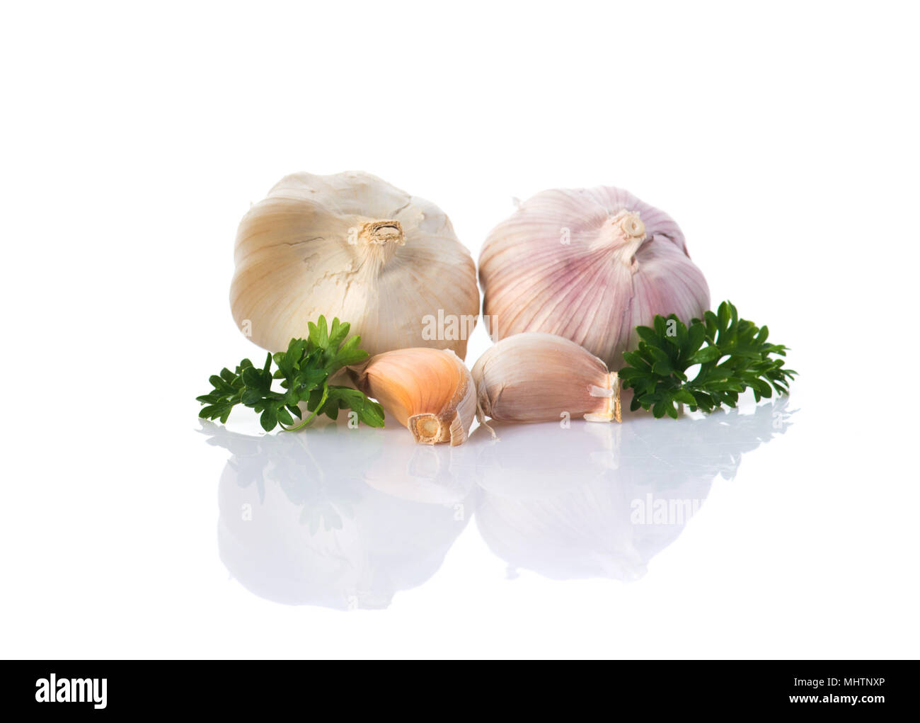 raw garlic isolated on white background Stock Photo - Alamy
