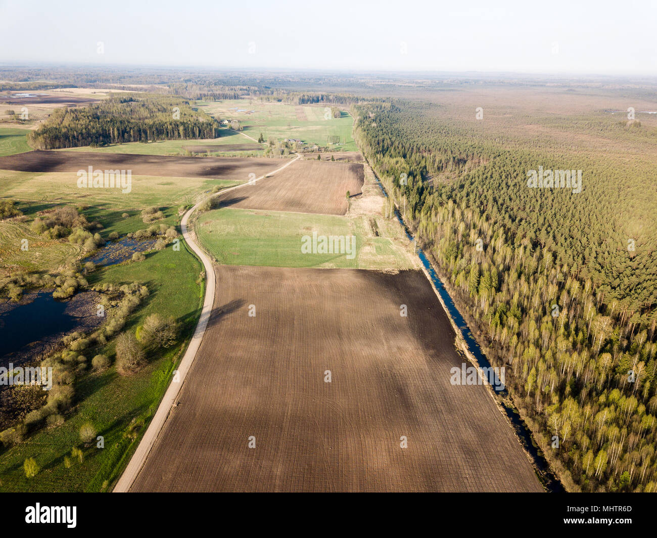 drone image. aerial view of rural area with freshly cultivated ...