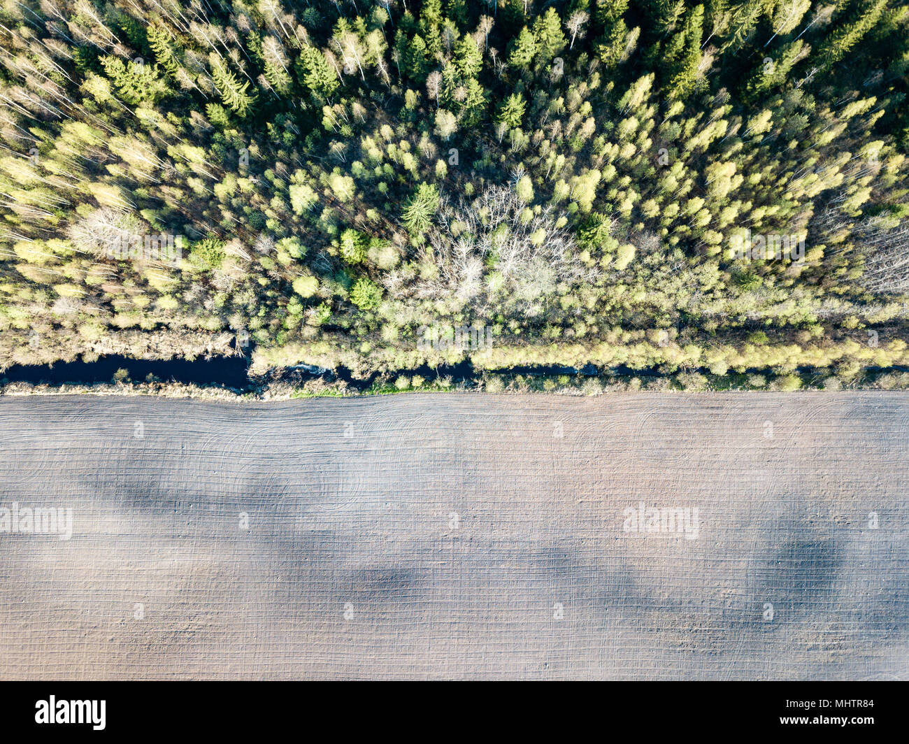 drone image. aerial view of rural area with fields and forests in ...