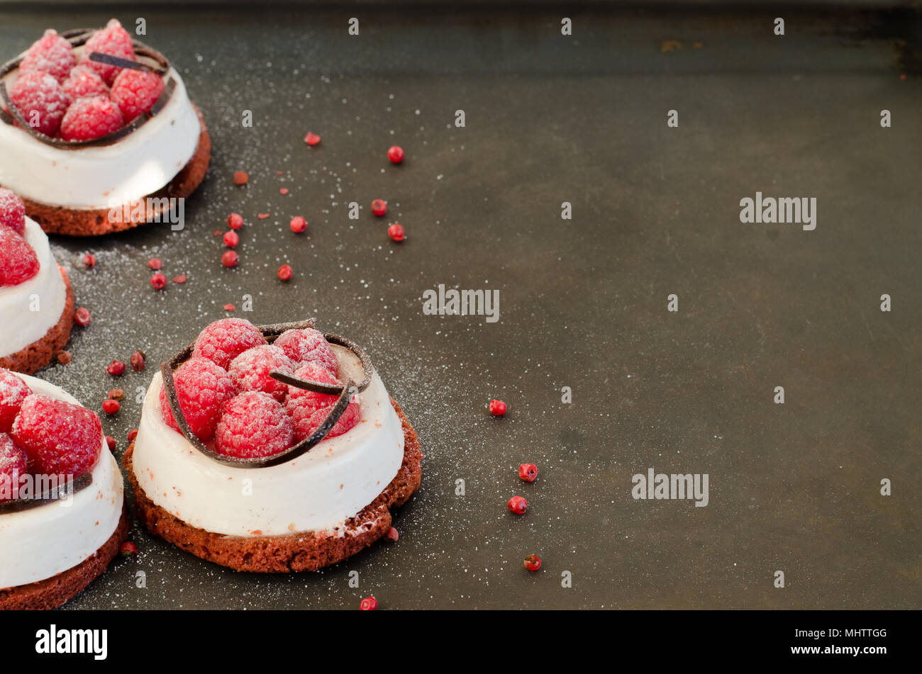 Cheesecake with raspberry on dark border background. Free space for ...