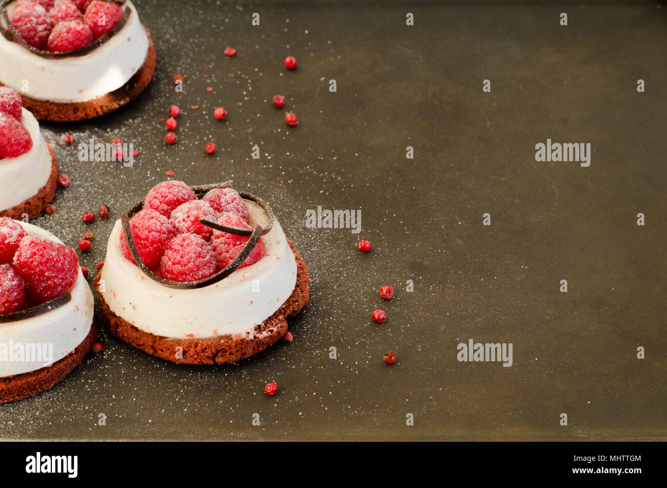 Cheesecake with raspberry on dark border background. Free space for ...