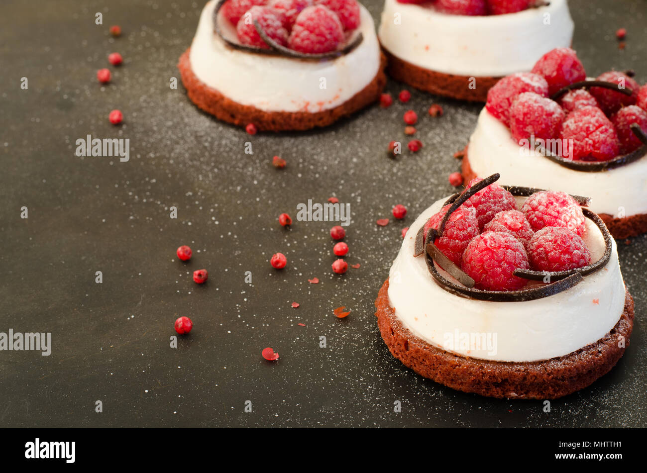Cheesecake with raspberry on dark border background. Free space for ...