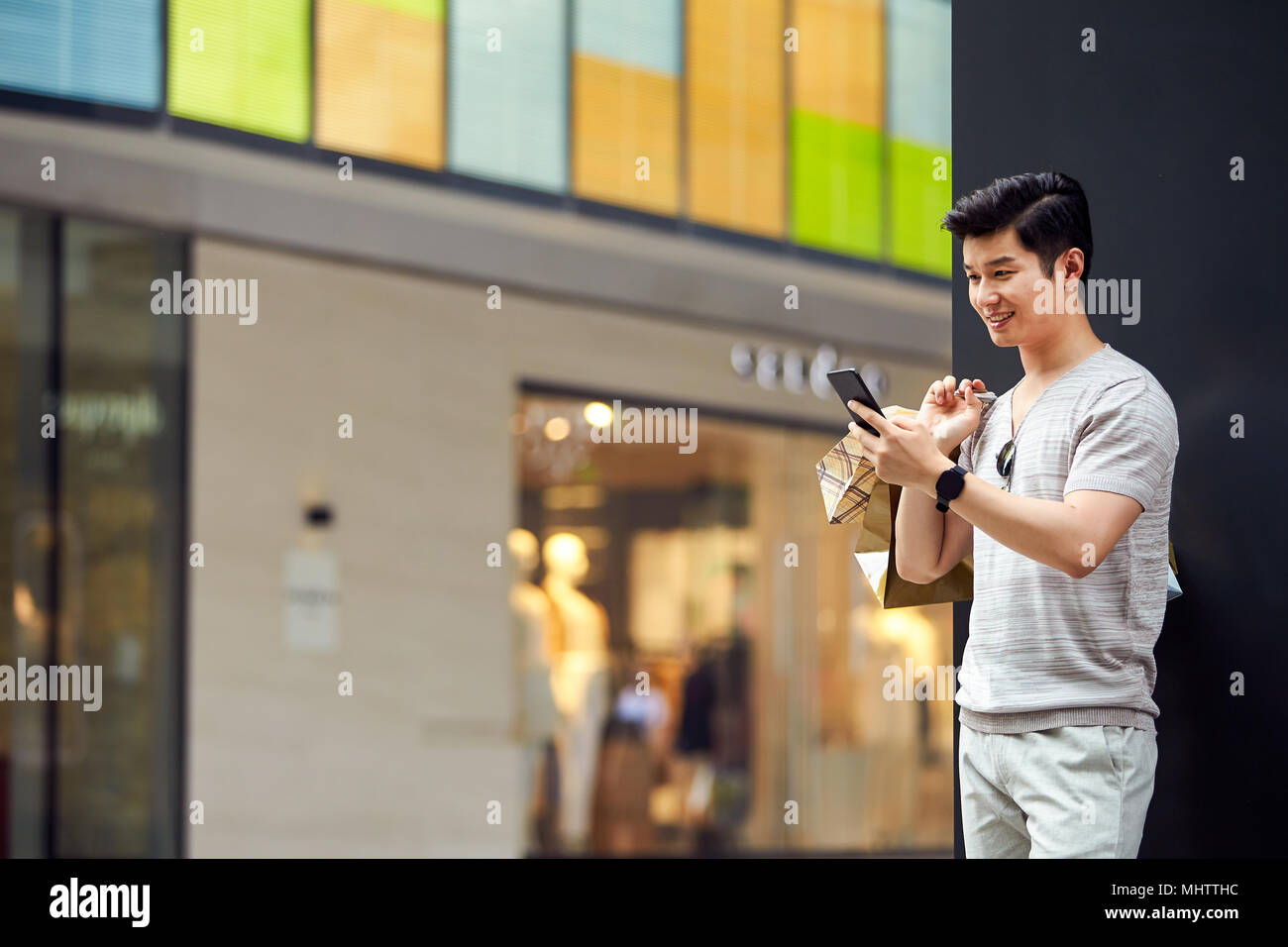 The young man the use of mobile phones Stock Photo - Alamy