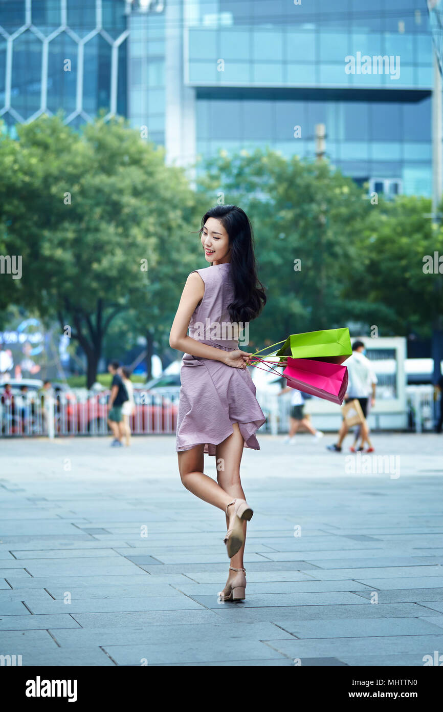 Young women go shopping shopping Stock Photo - Alamy