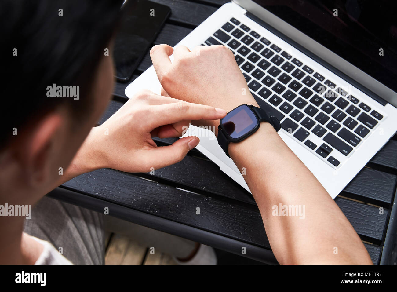 Young men watch Stock Photo - Alamy