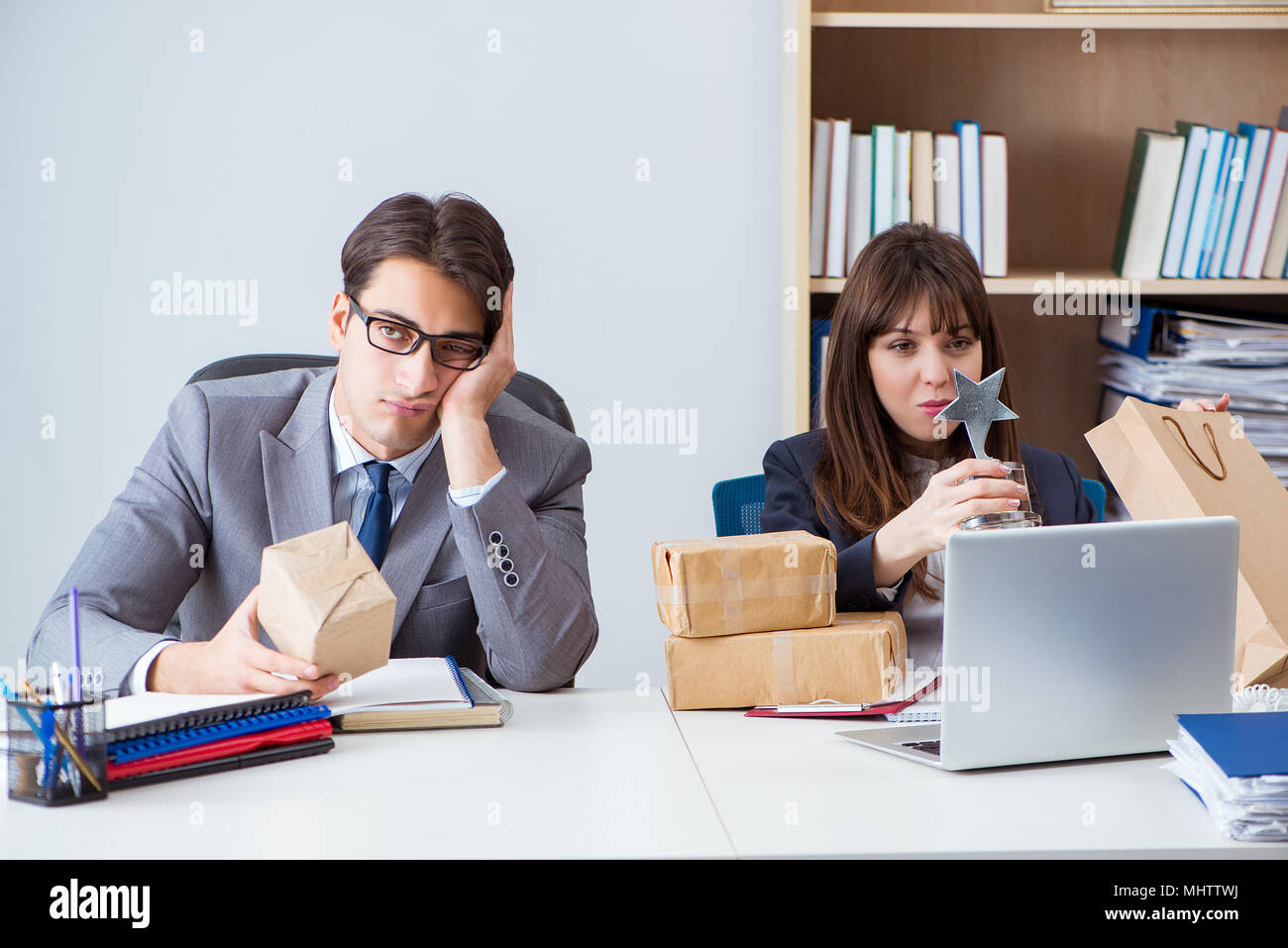 Business people receiving new mail and parcels Stock Photo - Alamy